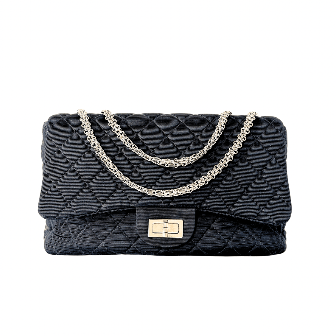 Chanel Quilted Reissue Flap Bag – SoHo Luxury Exchange